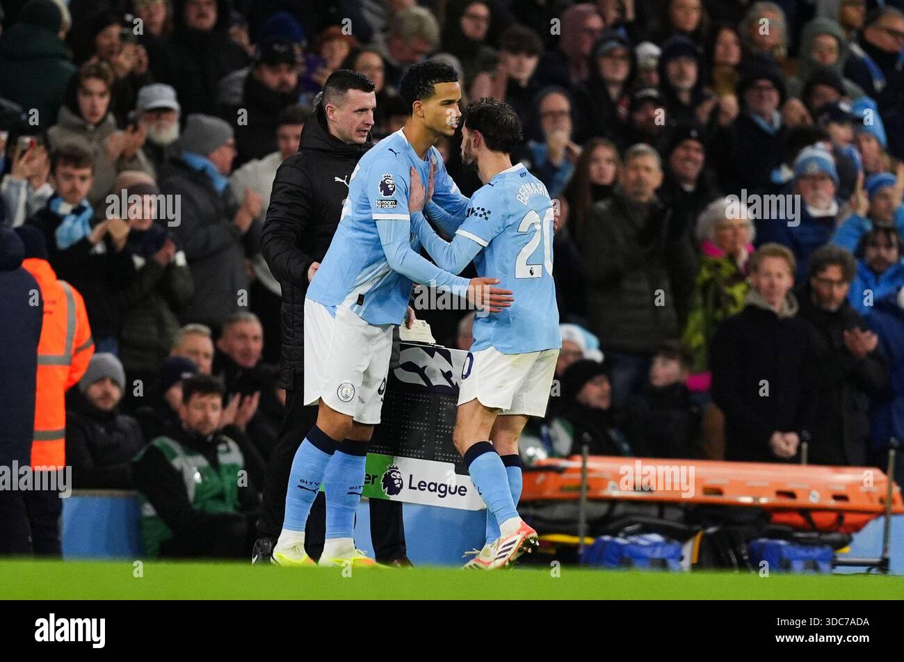 Manchester City's Divine Mukasa replaces Bernardo Silva during the ...