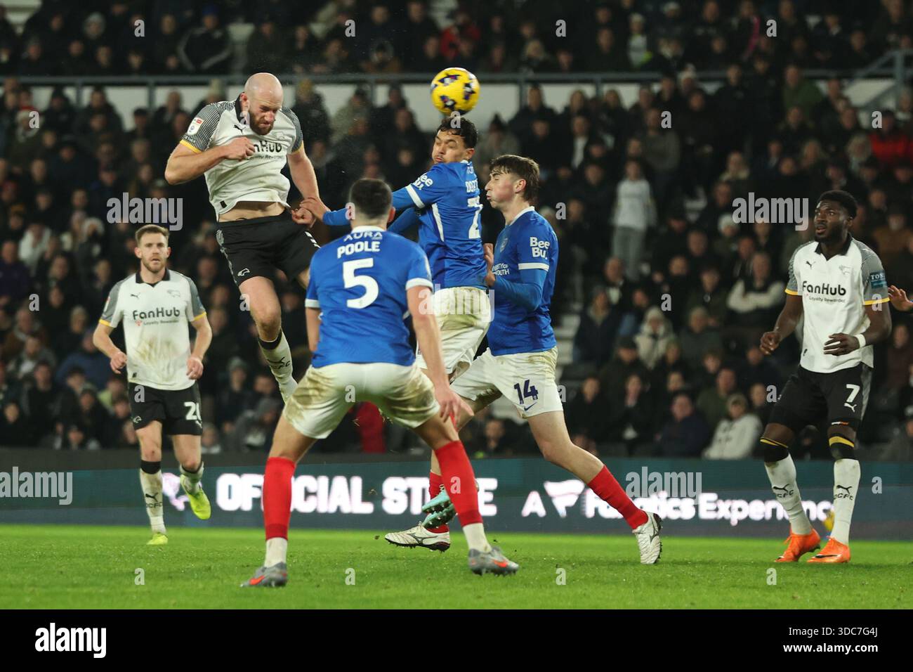 Derby County's Matthew Clarke (left) heads towards goal during the Sky ...