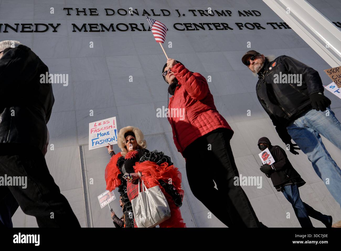 Demonstrators, including drag performer Tara Hoot, second from left ...