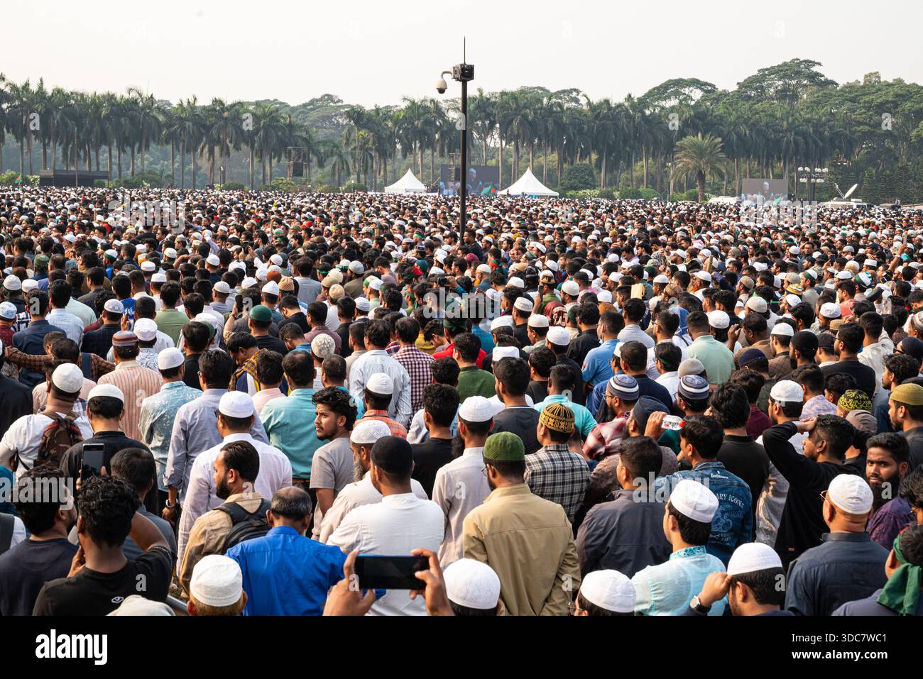 Dhaka, Bangladesh - 20 December 2025: Crowds gather during the funeral ...