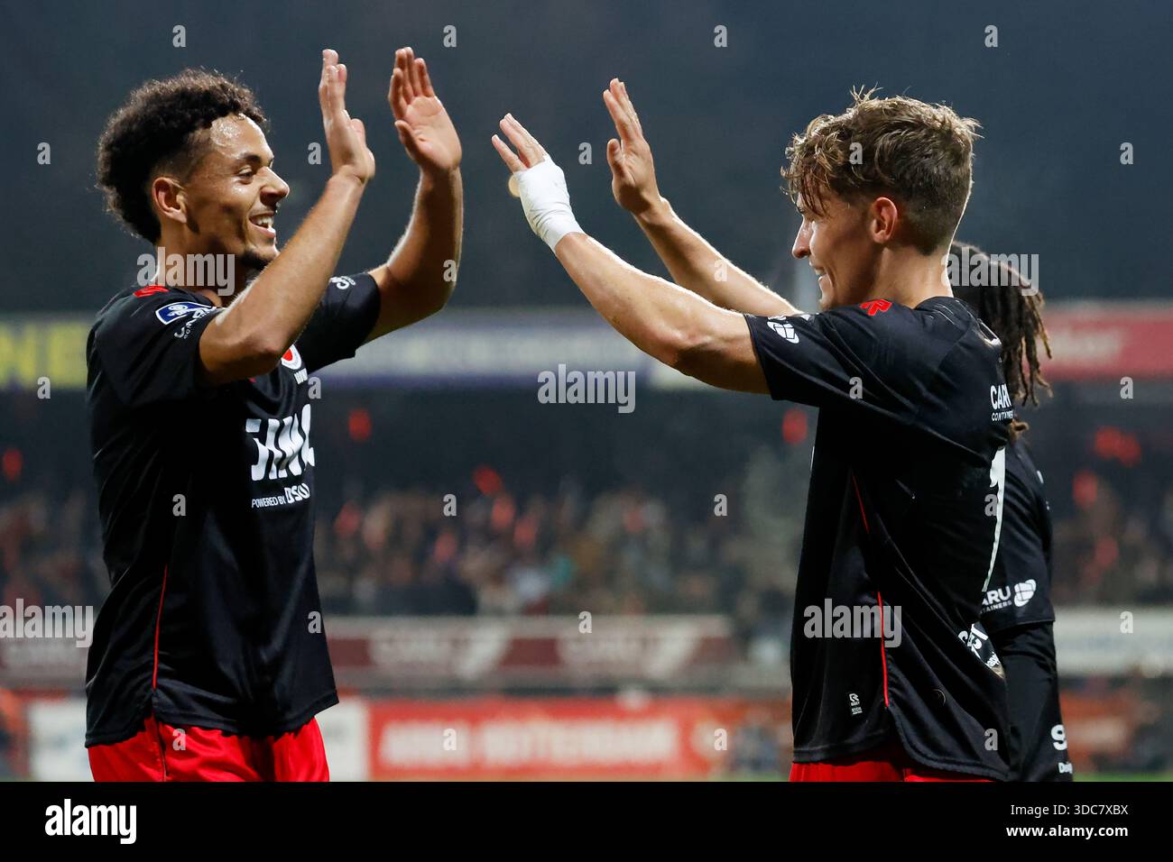 ROTTERDAM - Noah Naujoks (r) celebrates his goal with Ilias Bronkhorst ...