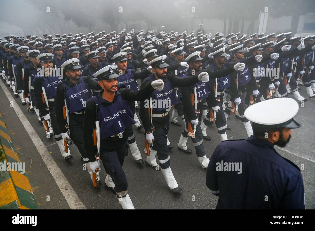 NOIDA, INDIA - DECEMBER 20: On a cold and foggy morning, an Indian ...