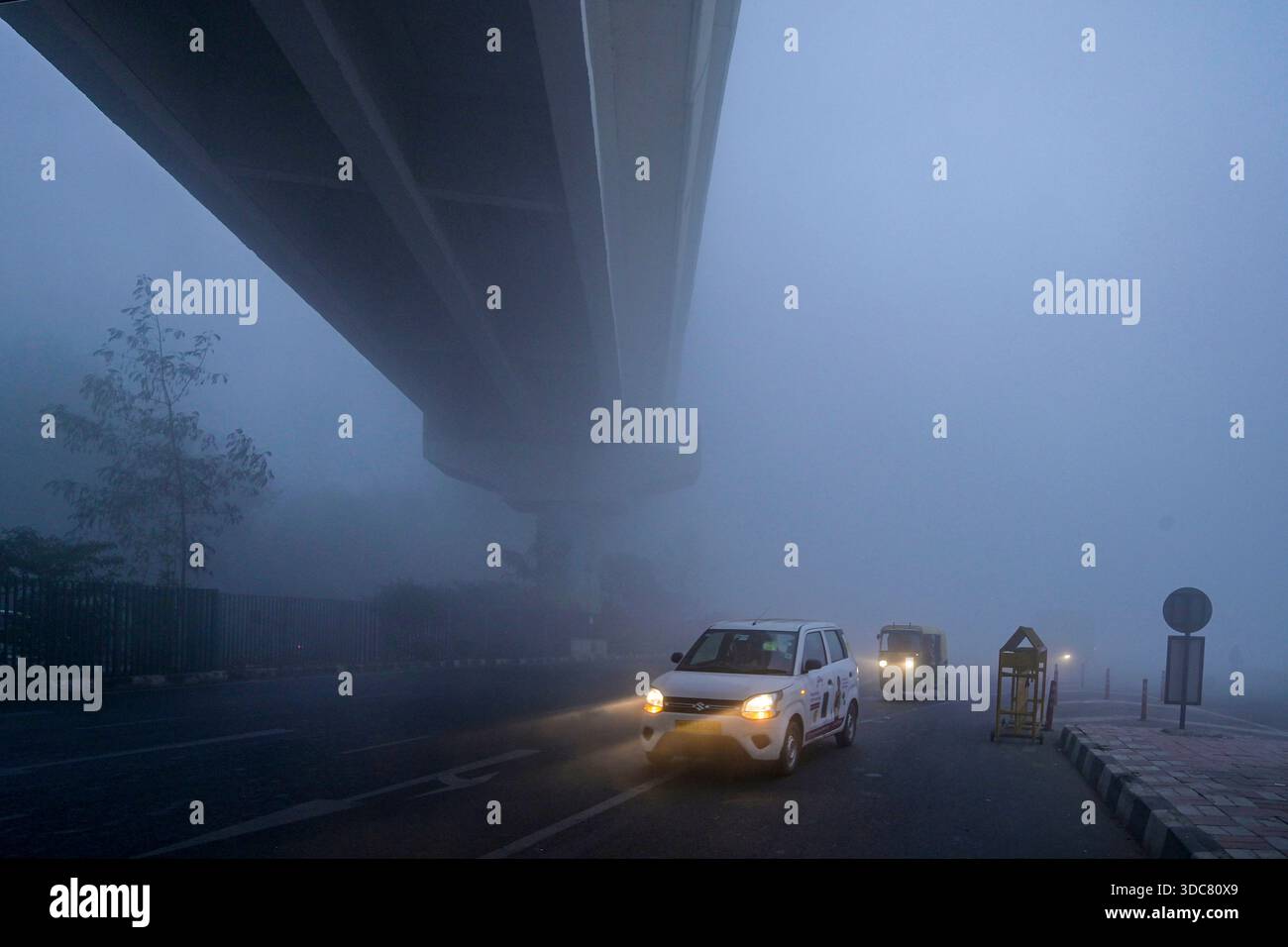 NEW DELHI, INDIA - DECEMBER 20: People seen out on a cold and Foggy ...