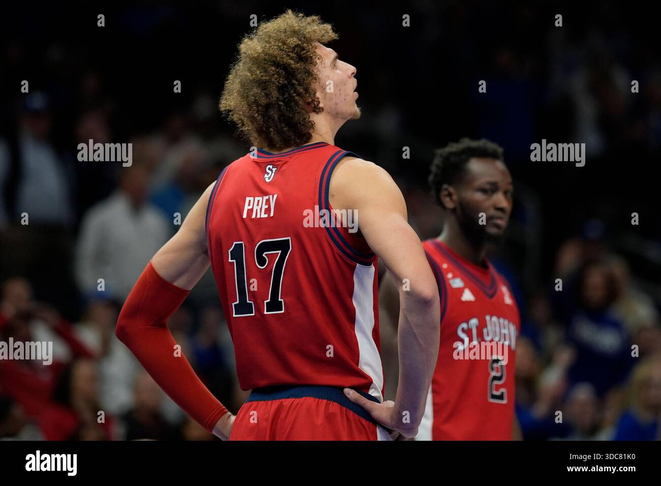 St. John's forward Rubén Prey (17) watches a replay during the first ...