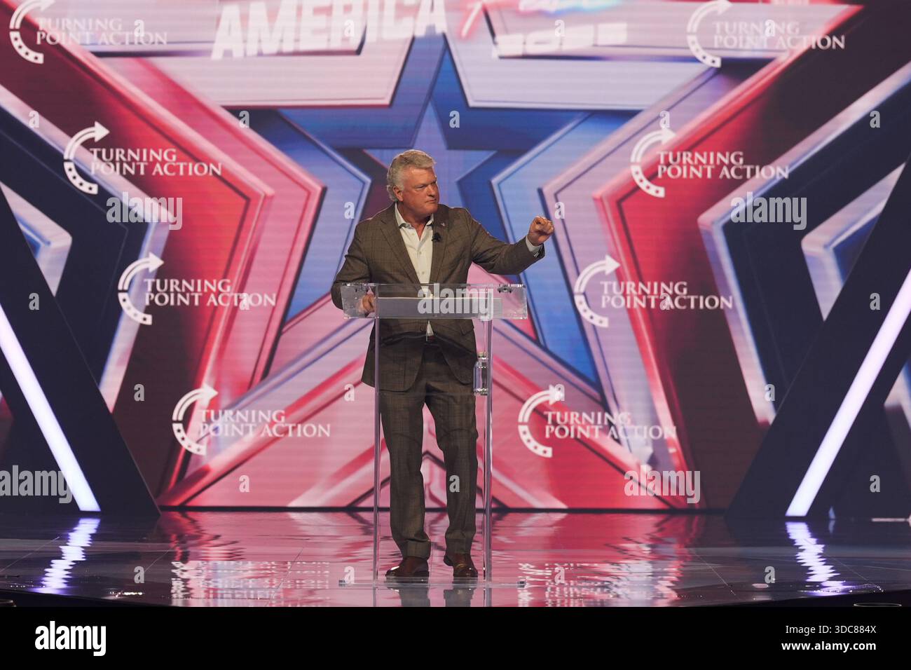 Ga. Rep. Mike Collins speaks during Turning Point USA's AmericaFest ...