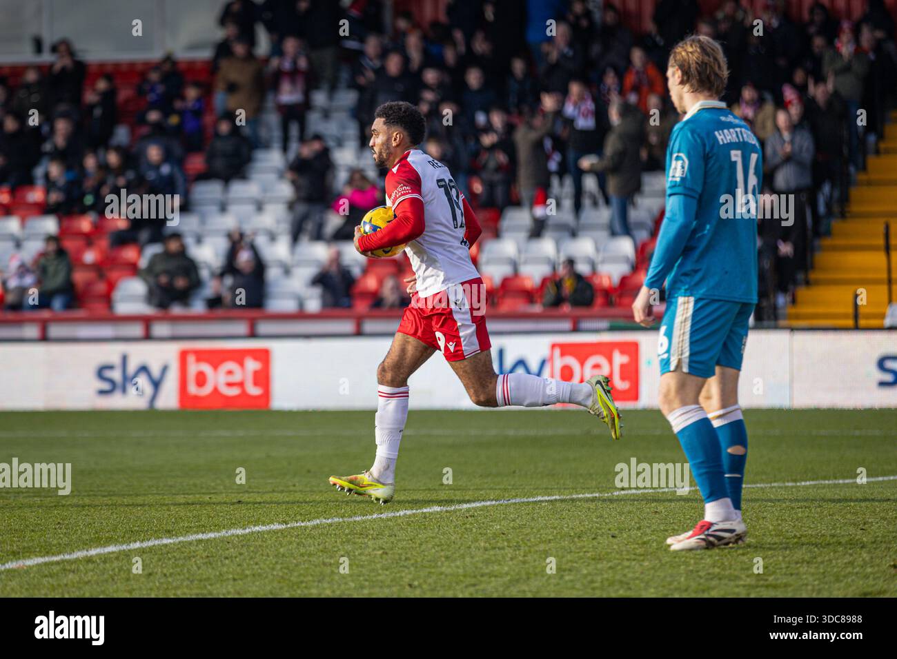Jamie Reid (19 Stevenage) goes to get the ball to ensure a quick ...