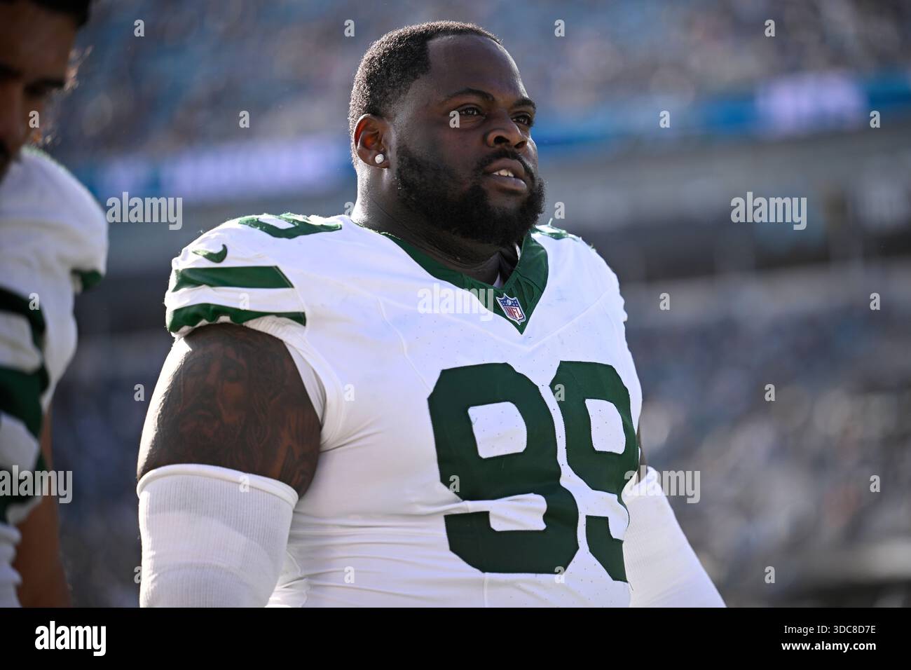 New York Jets defensive tackle Khalen Saunders (99) leaves the field ...