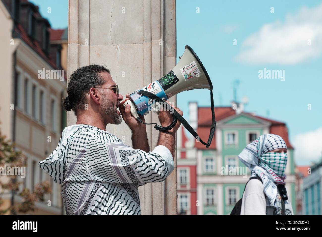 Protester using megaphone during Palestine solidarity demonstration in ...