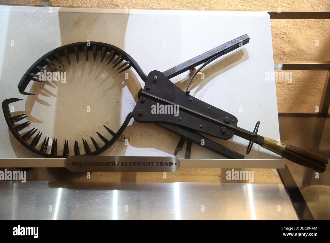 An elephant trap is displayed at the Elephant Museum at the Konni ...