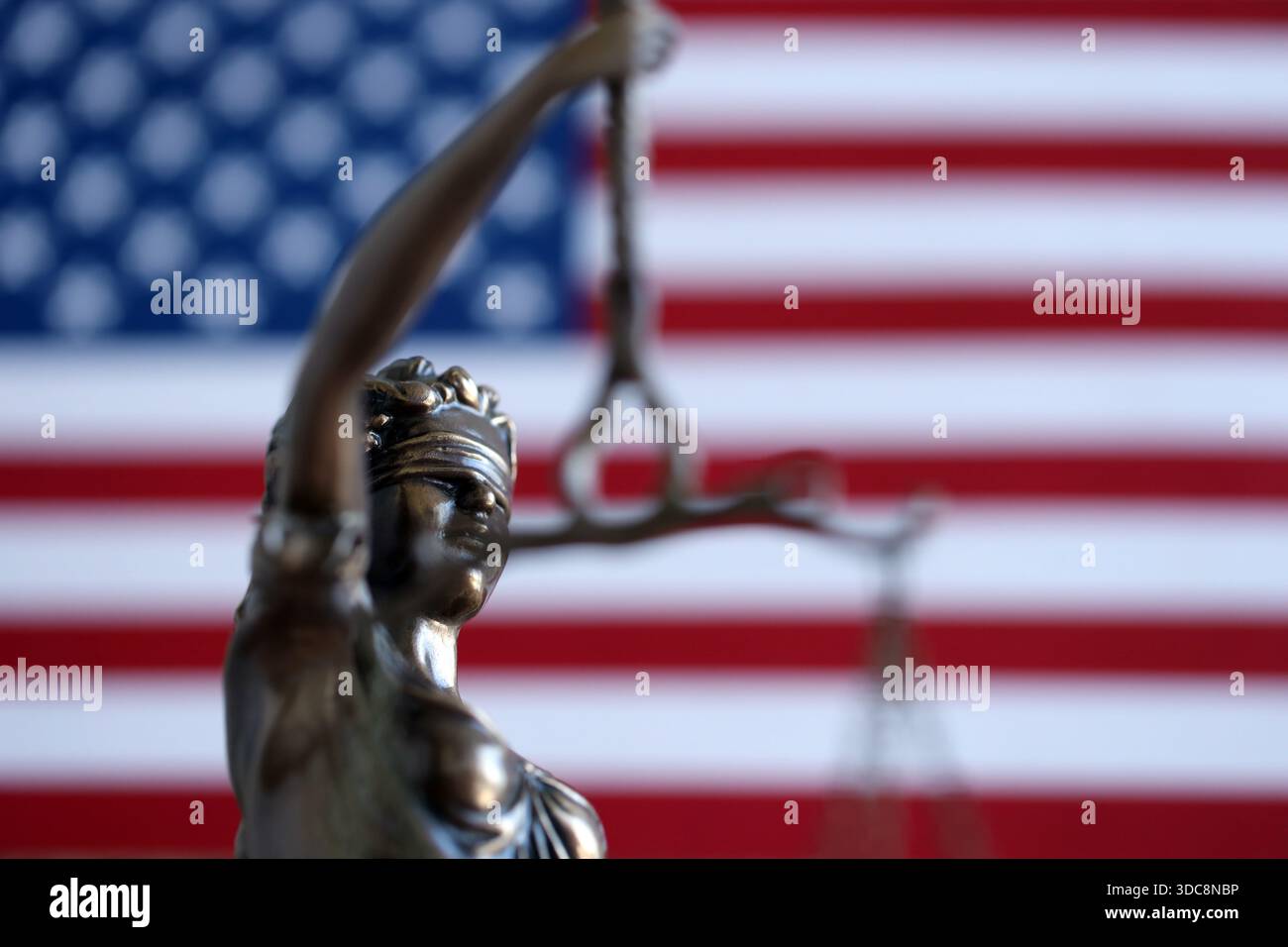 The statue of justice Themis or Justitia, the blindfolded goddess of ...
