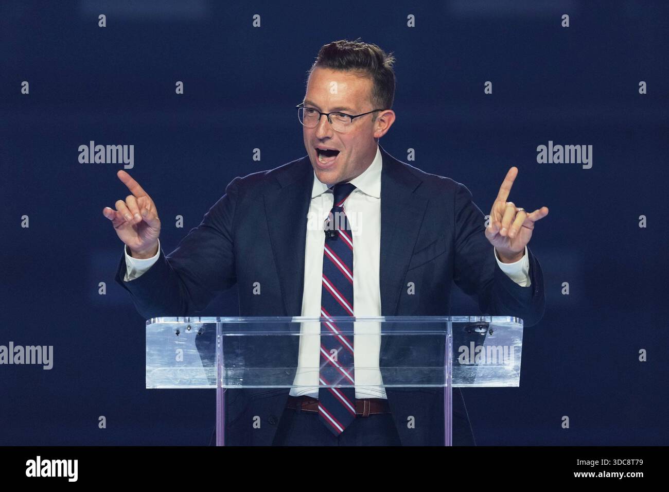 Benny Johnson speaks during Turning Point USA's AmericaFest 2025 ...