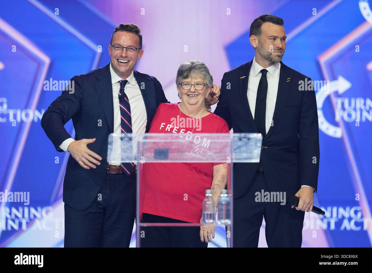 From left, Benny Johnson, Jeanie Beeman and Jack Posobiec stand on ...
