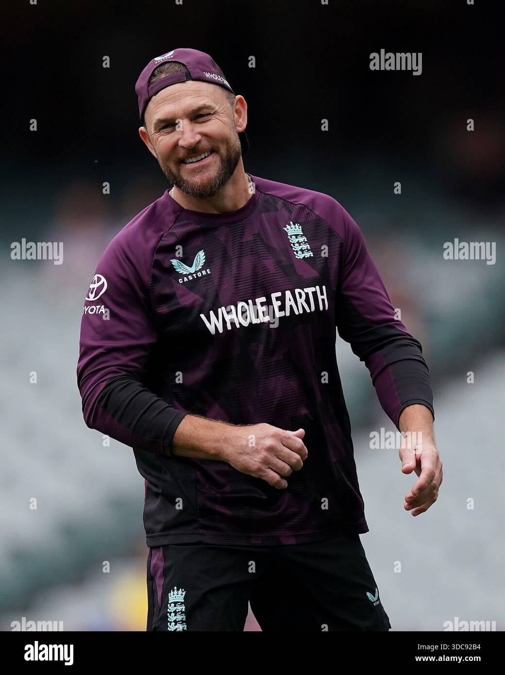 England head coach Brendan McCullum smiles on day five of the third ...