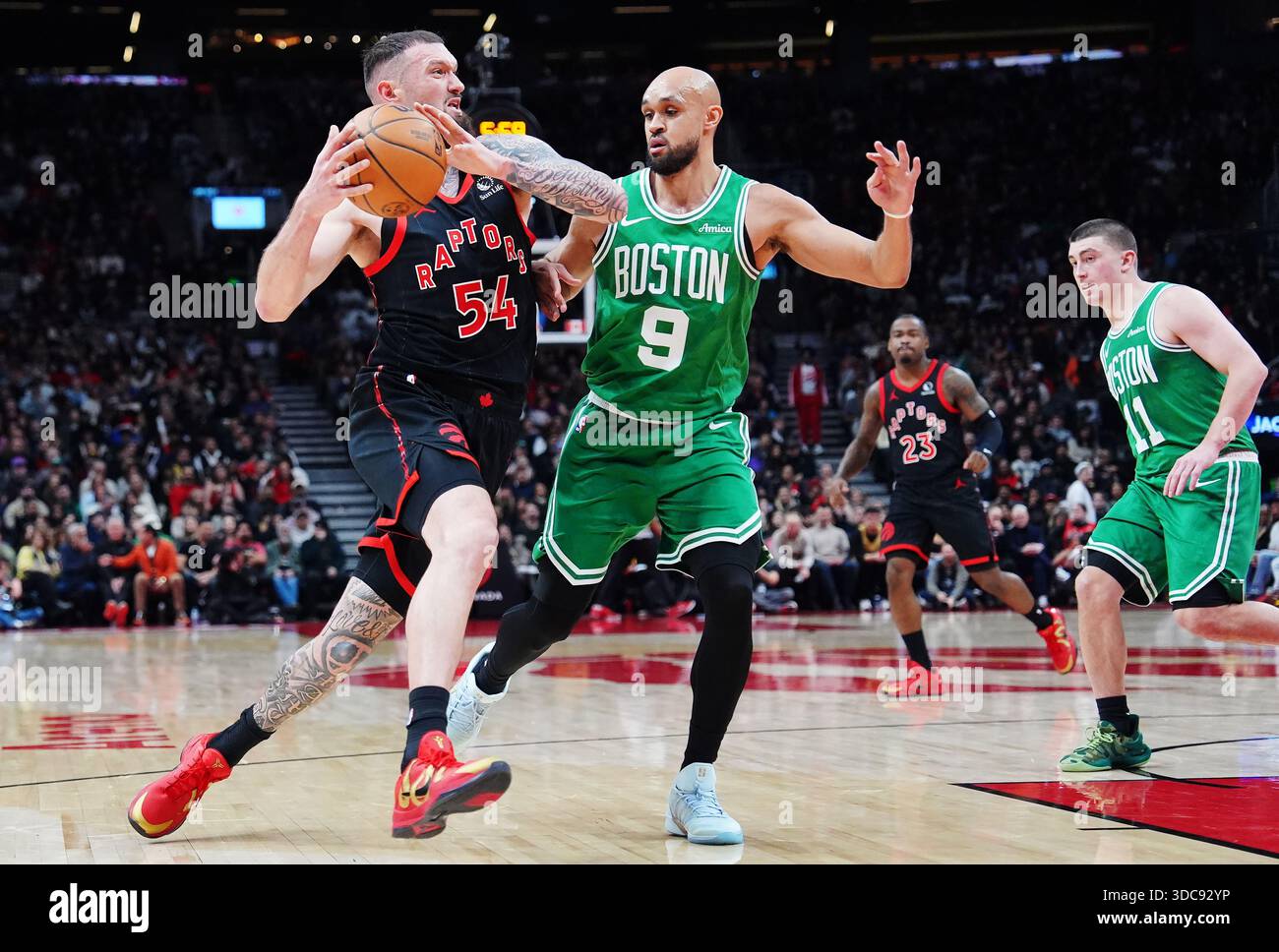 Toronto Raptors' Sandro Mamukelashvili (54) drives as Boston Celtics ...