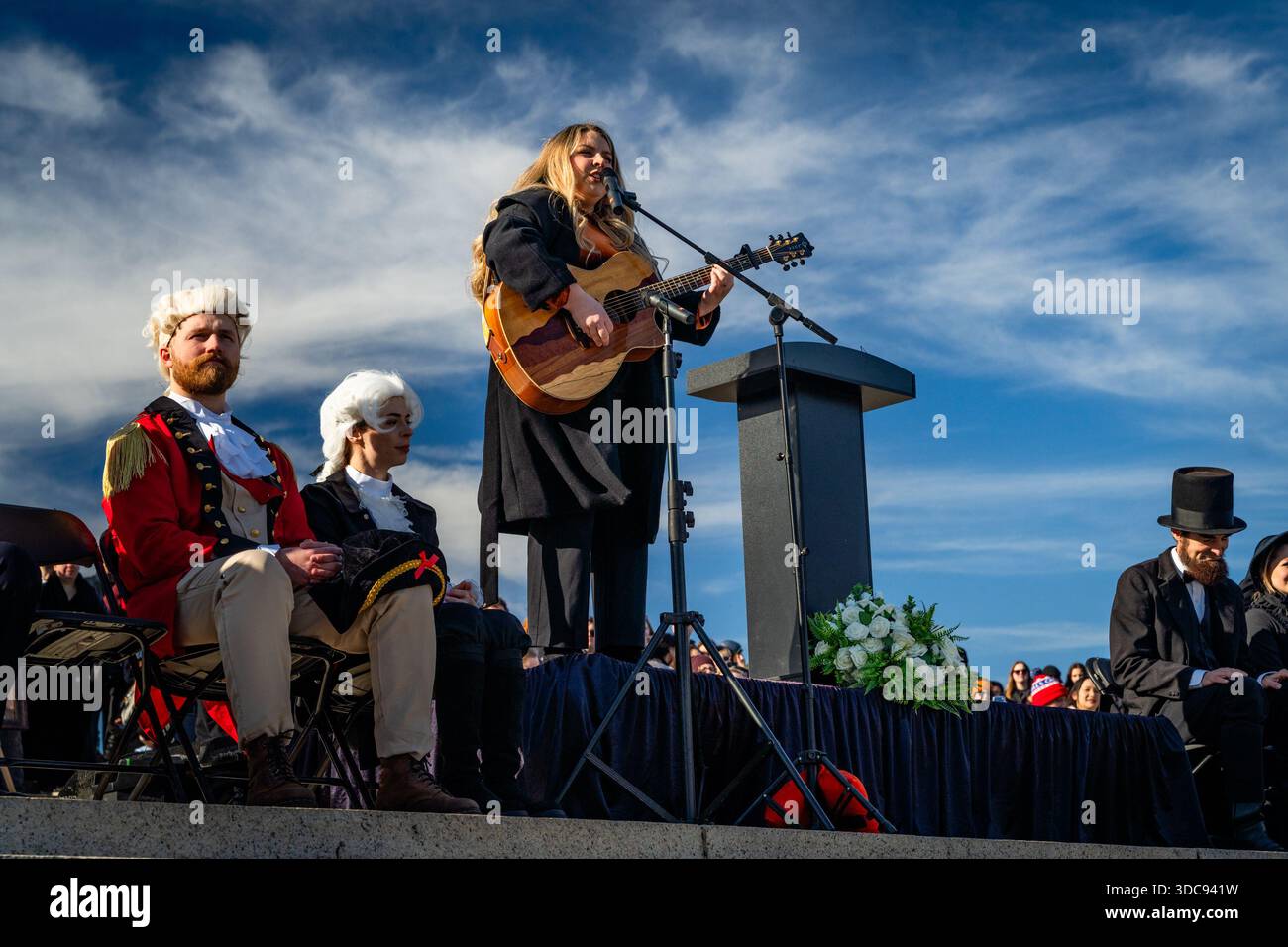 Singer Cori Kennedy performs her song, “The Last Lincoln,” at a funeral ...