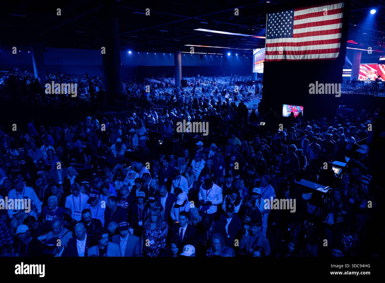 Attendees exit the speaker area during Turning Point USA's AmericaFest ...