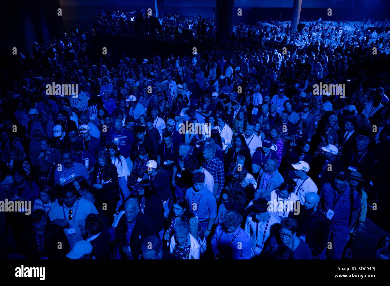 Attendees exit the speaker area during Turning Point USA's AmericaFest ...