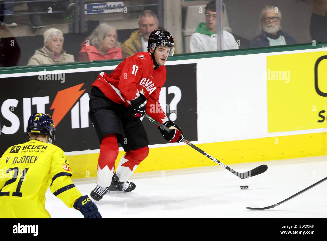 Canada forward Tij Iginla (11) looks to pass against Sweden during the ...