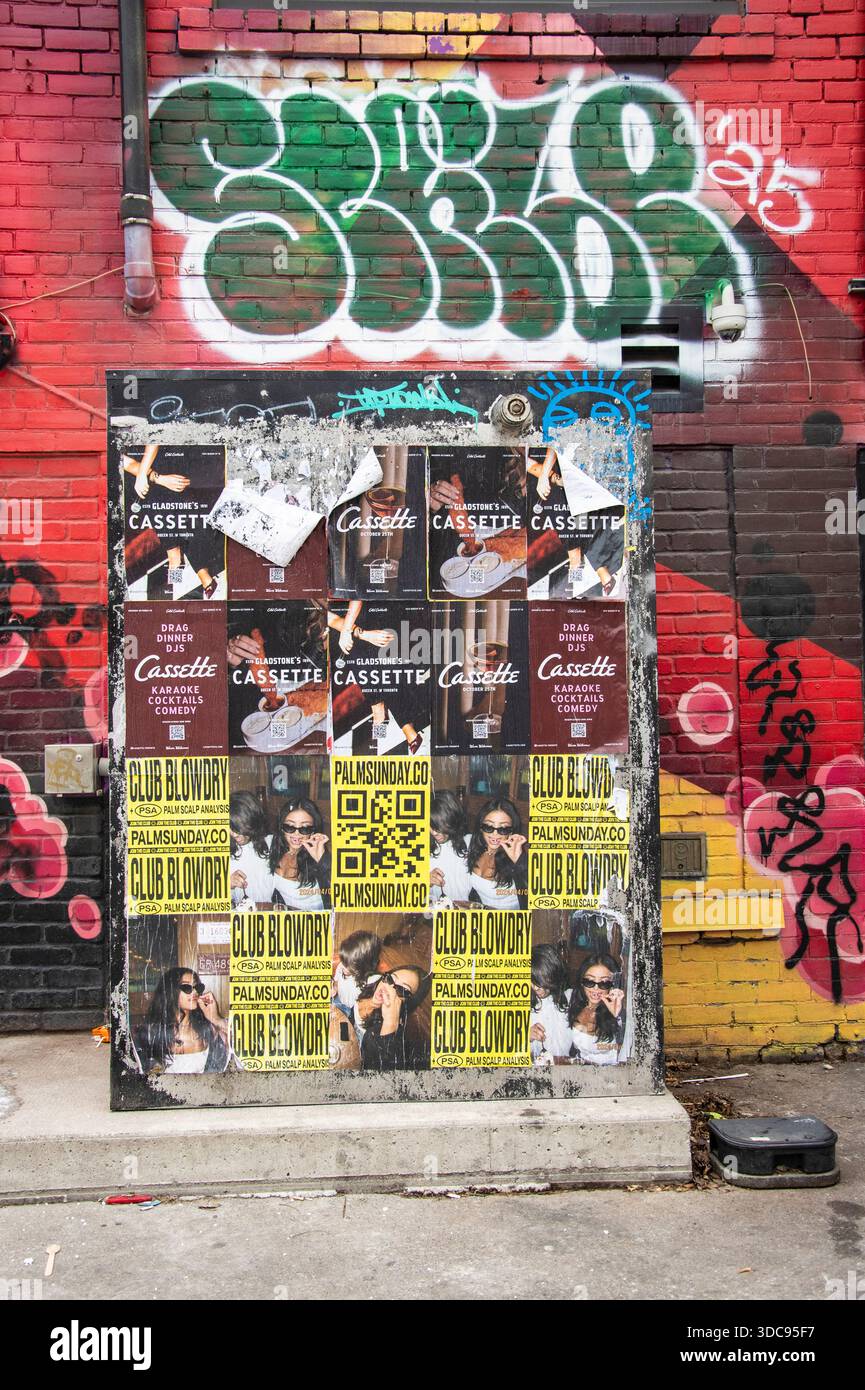 Graffiti tagged and posters at Graffiti Alley fashion district in ...