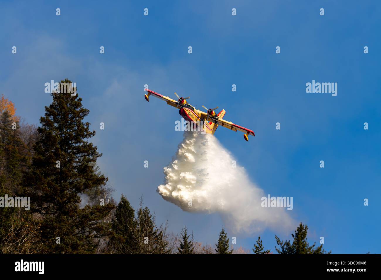 Canada, Quebec, 17 October 2025 : Firefighting aircraft releases water ...