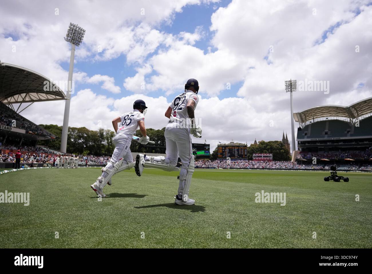 England’s Will Jacks (left) and Brydon Carse (right) walk out to bat ...