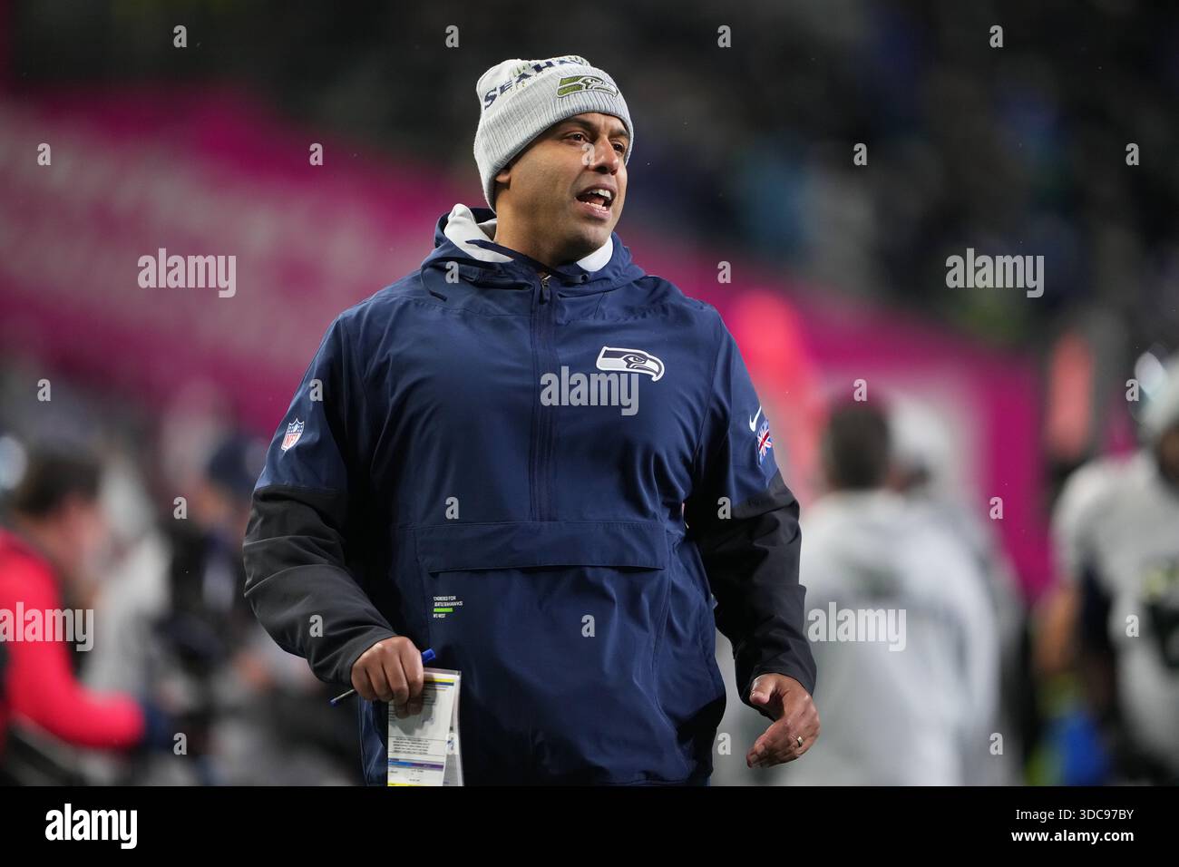 Seattle Seahawks defensive coordinator Aden Durde talks to players as ...