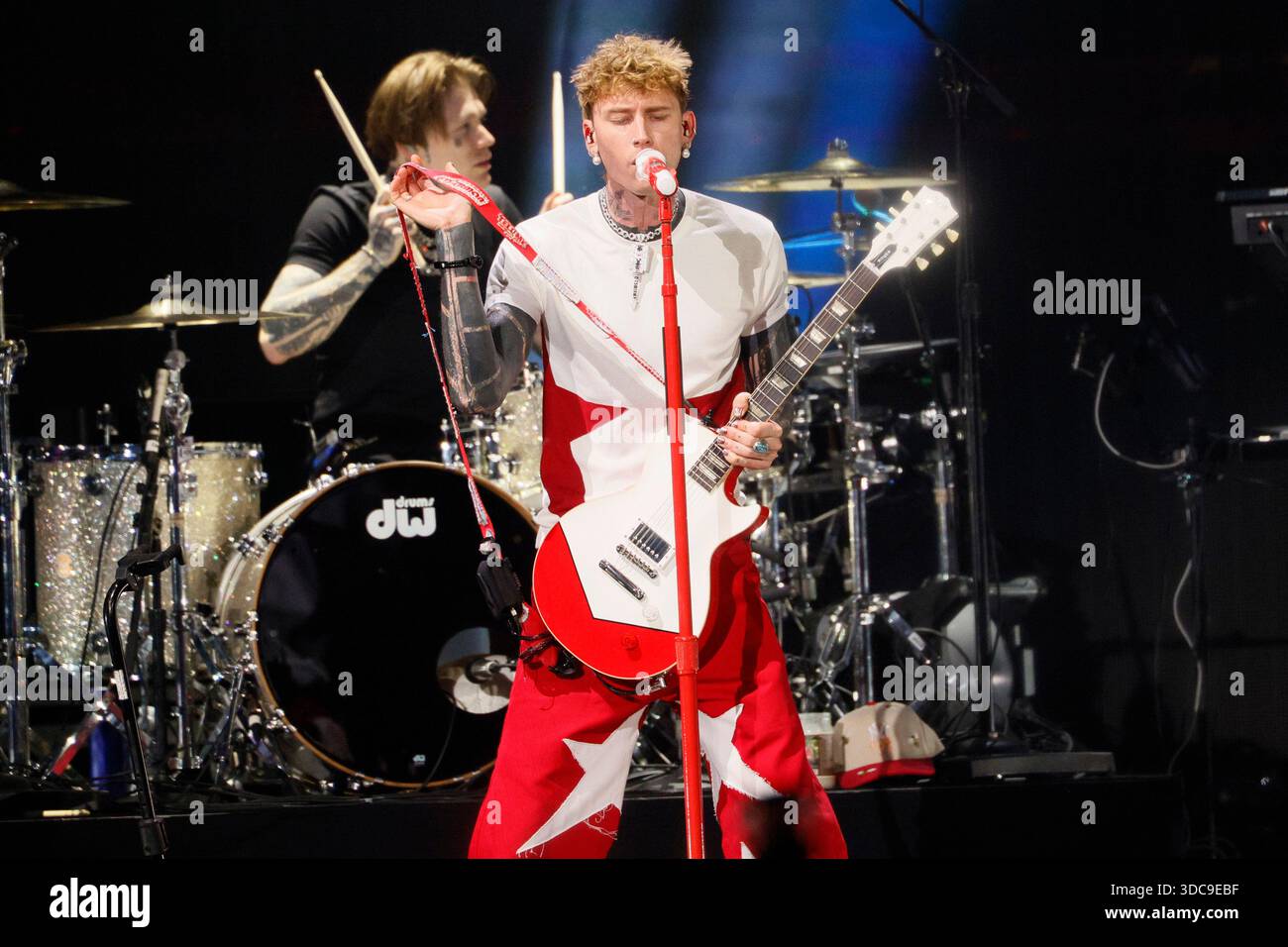 MGK performs at the Y100's iHeartRadio Jingle Ball 2025 show at the ...