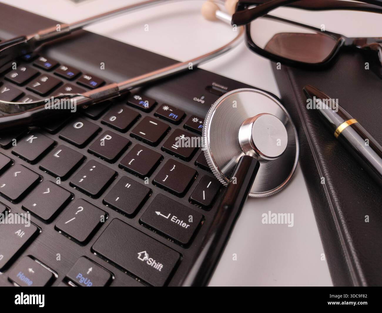 Stethoscope resting on tablet hi-res stock photography and images - Alamy