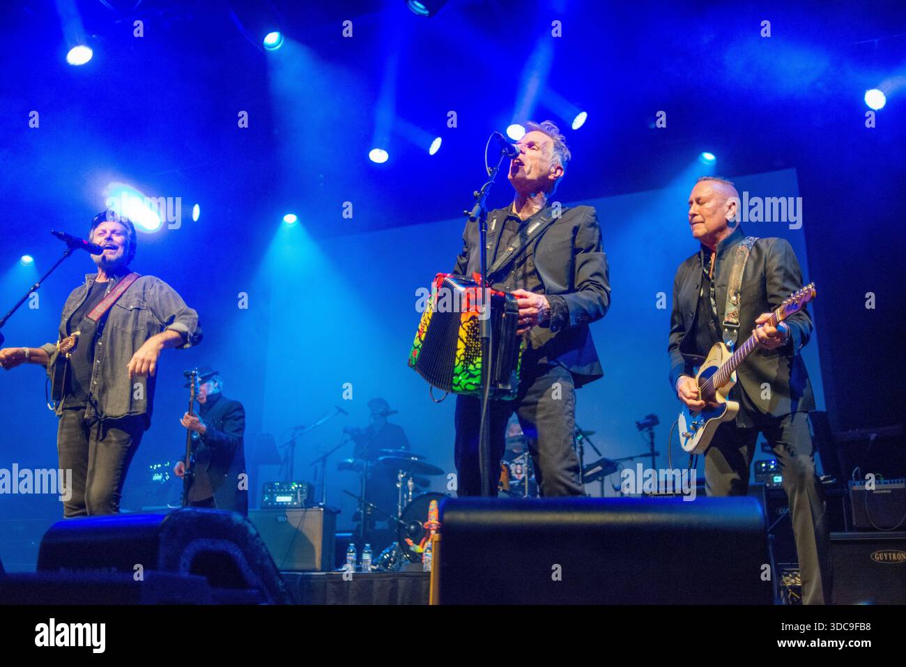 Eric Bazilian, Rob Hyman and John Lilley of the Hooters perform during ...