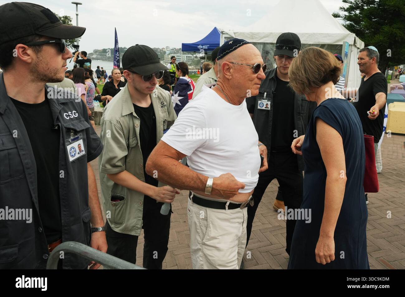 Security personnel check guests at Bondi Pavilion in Sydney, Sunday ...