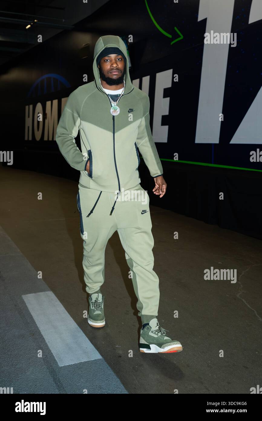 Seattle Seahawks cornerback Devon Witherspoon (21) arrives before an ...