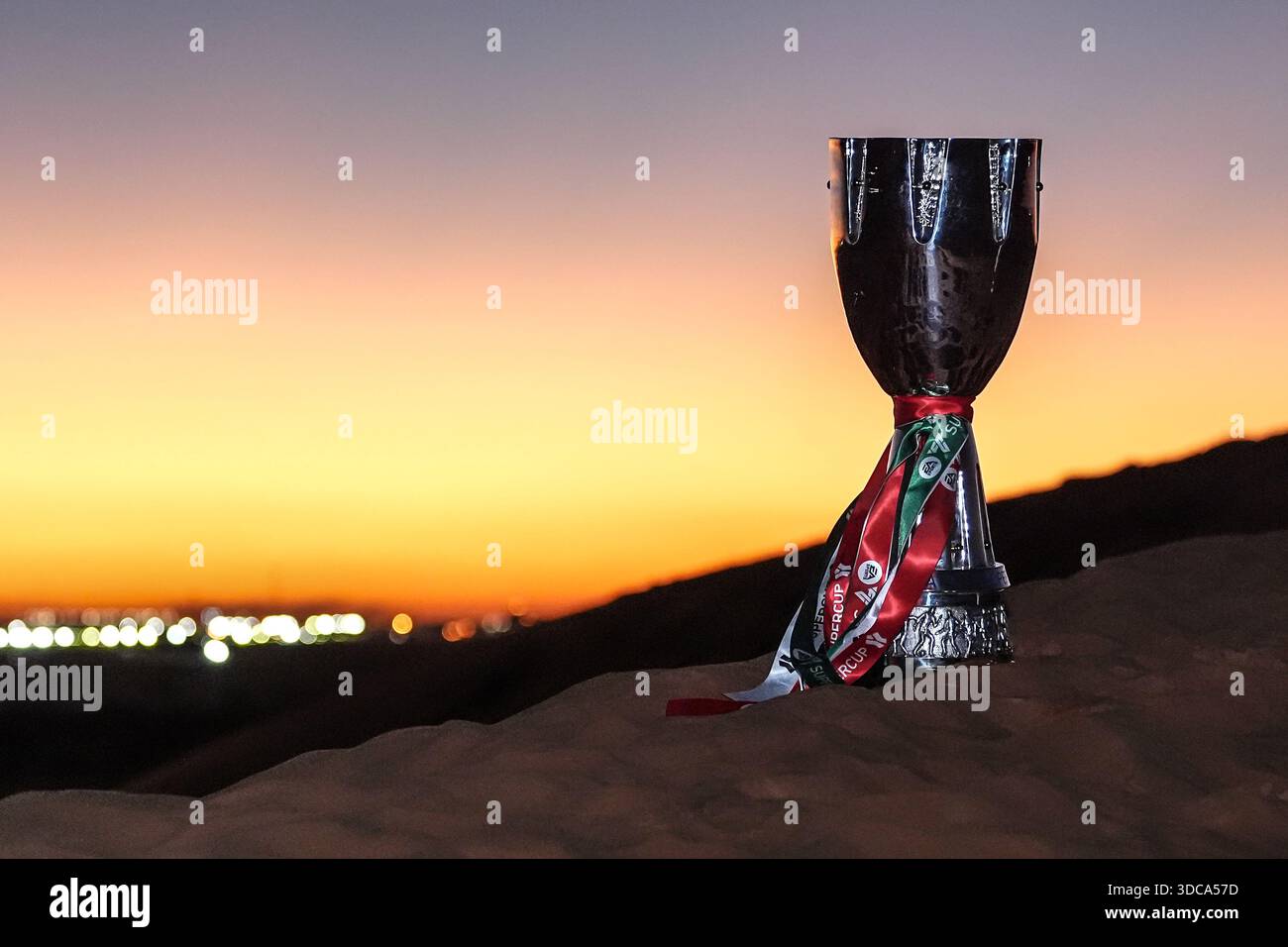 The Italian Super Cup standing in desert landscape at sunset , Saudi ...