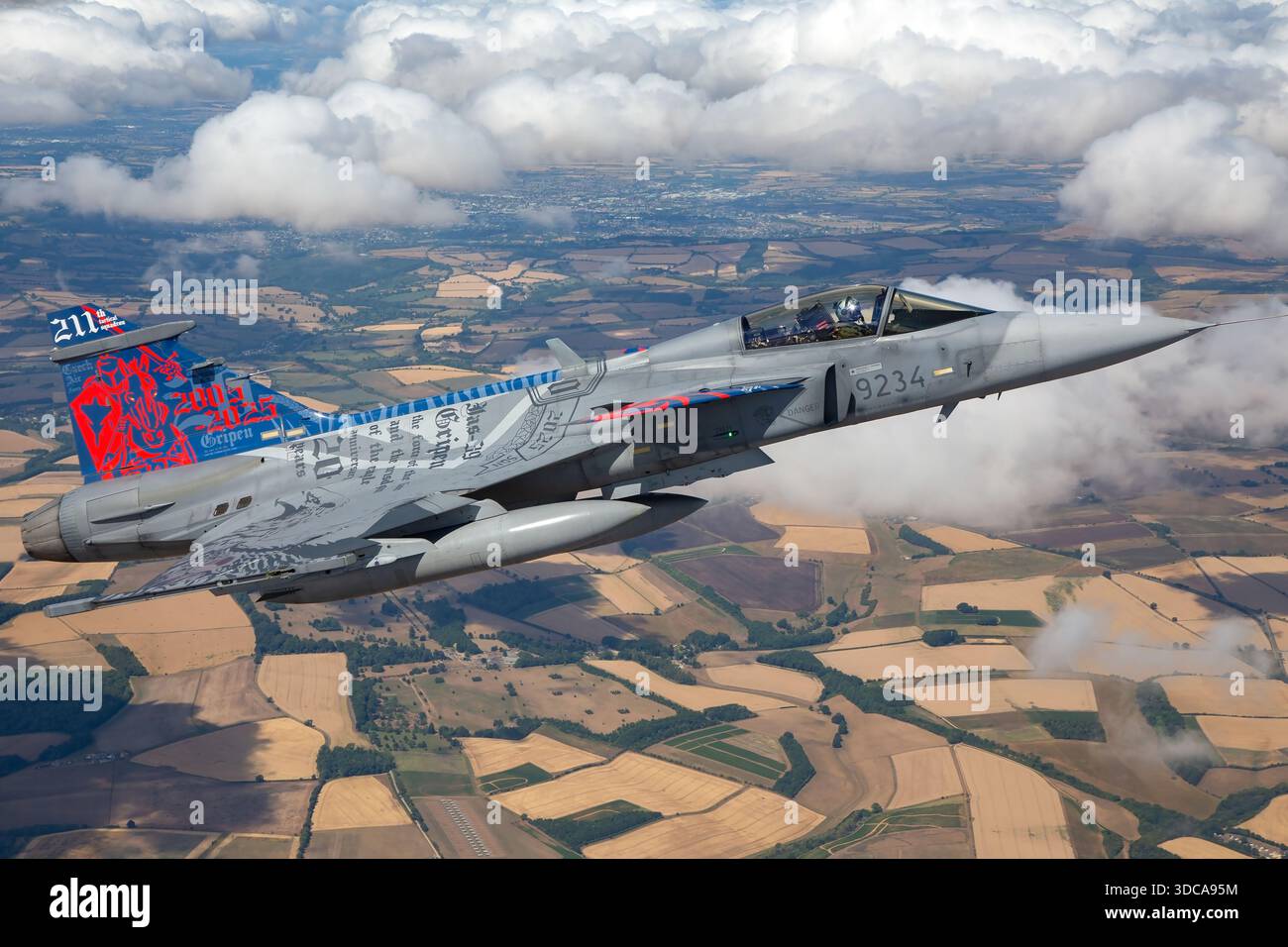 The photograph depicts a Czech Air Force Saab JAS 39C Gripen fighter ...