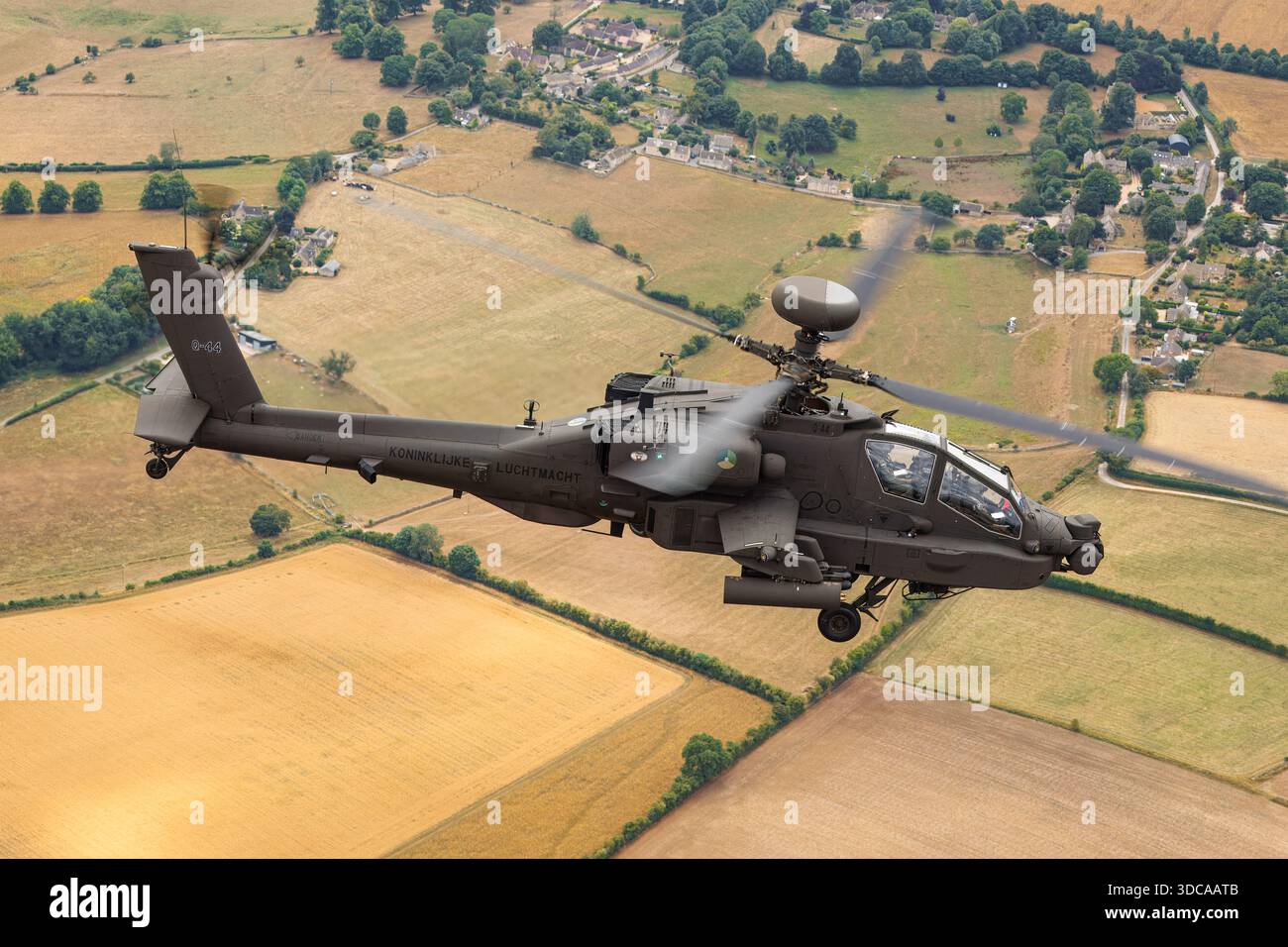 The photograph presents a Royal Netherlands Air Force Boeing AH-64E ...