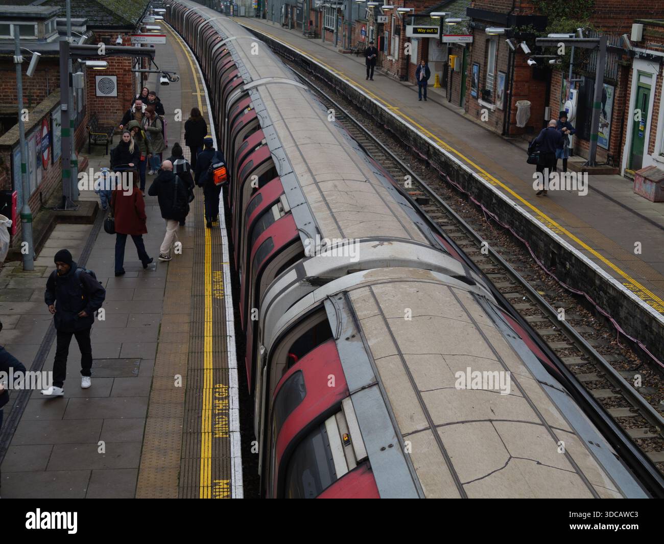 Central Line tube train on the outdoor section of the TFL underground ...
