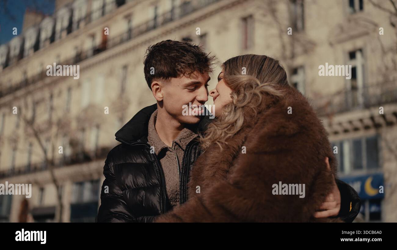Young couple embraces affectionately paris hi-res stock photography and ...