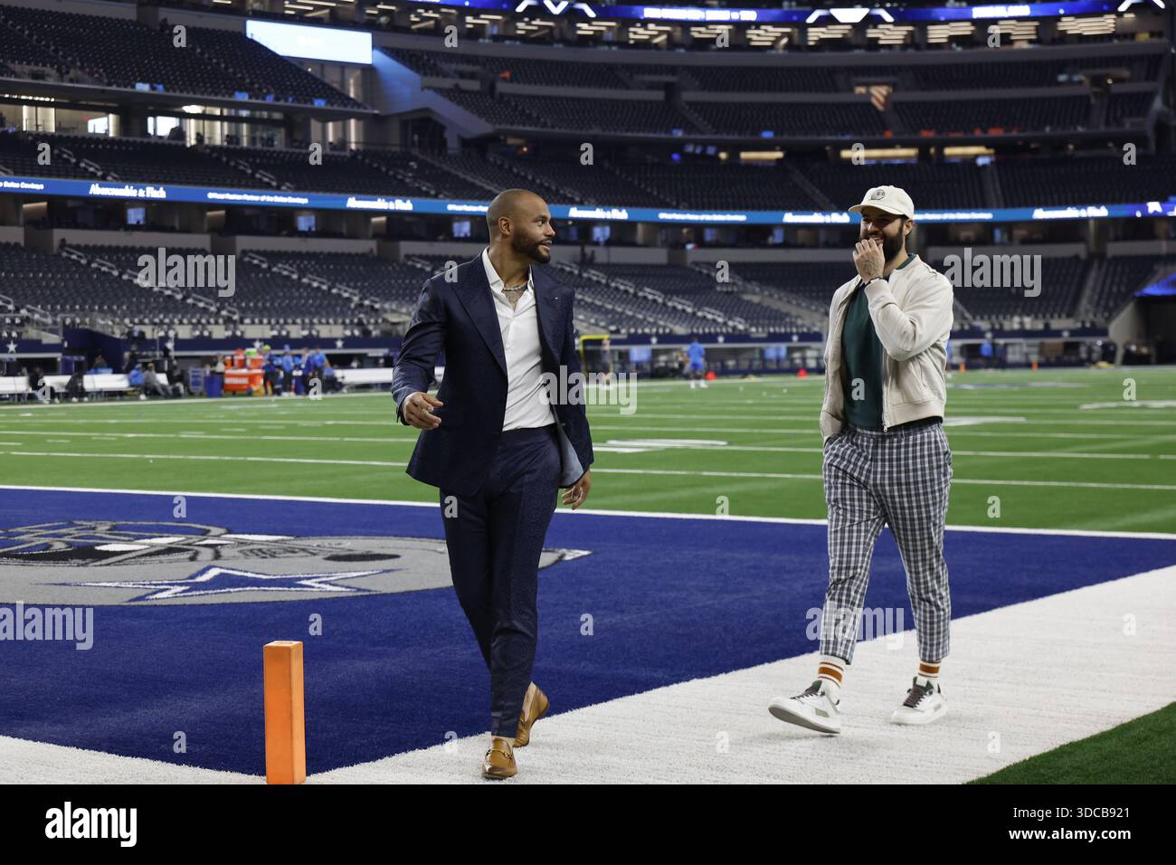 Dallas Cowboys quarterback Dak Prescott (4) walks the sideline with ...