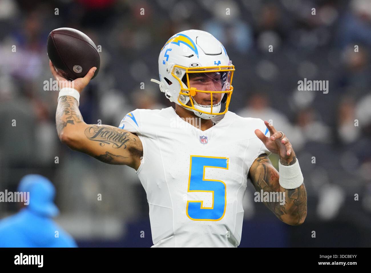Los Angeles Chargers quarterback Trey Lance (5) warms up before an NFL ...