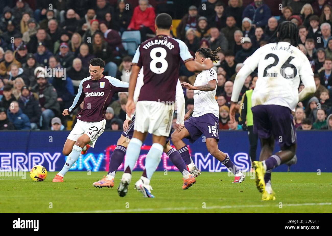 Aston Villa's Morgan Rogers (left) scores their side's first goal of ...
