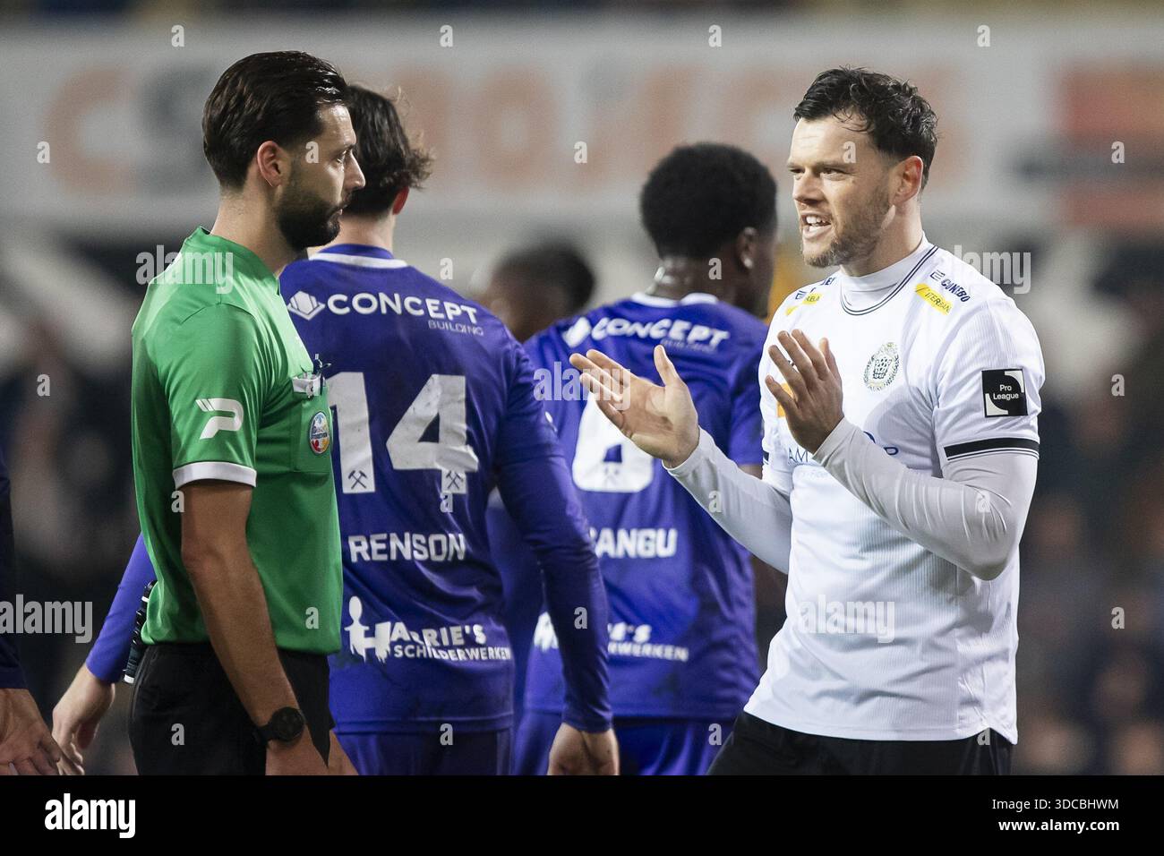 Lokeren's Tom Boere talks to the referee during a soccer game between ...