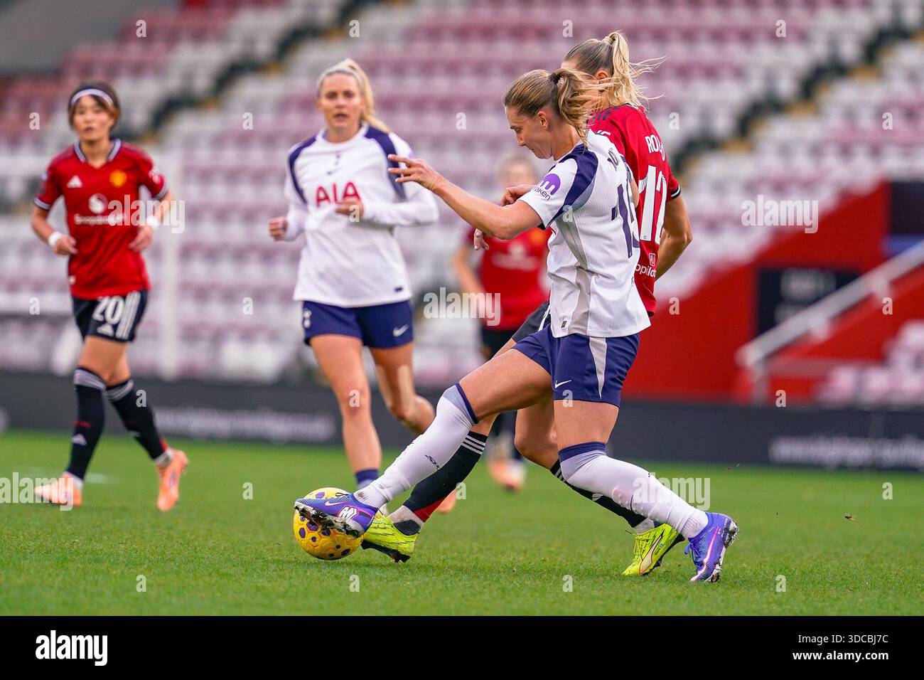 LEIGH, ENGLAND - December 21: Clare Hunt tof Spurs take on Fridolina ...