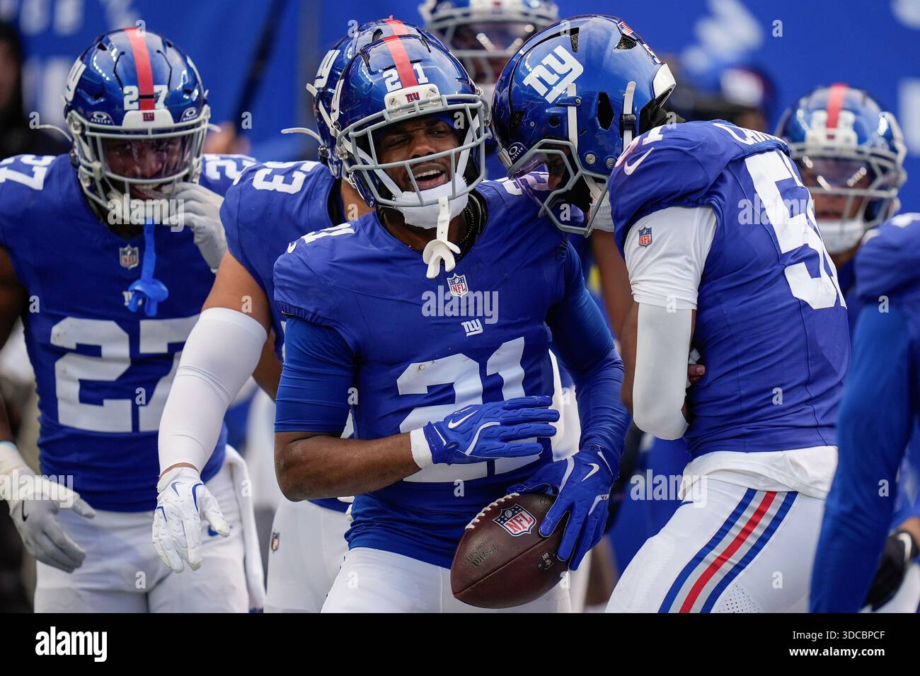 New York Giants cornerback Paulson Adebo (21) celebrates with teammates ...