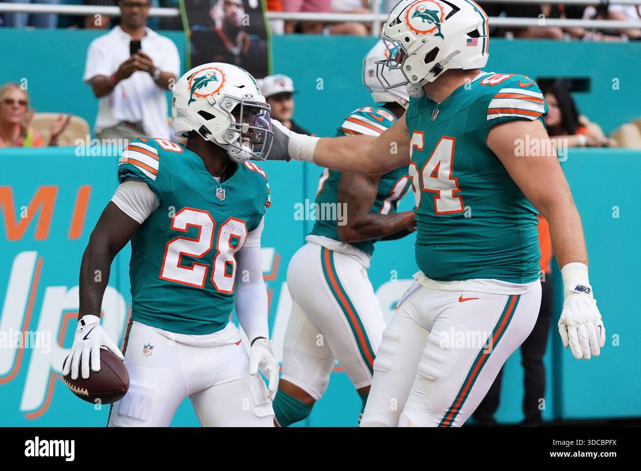 Miami Dolphins running back De'Von Achane (28) celebrates a touchdown ...