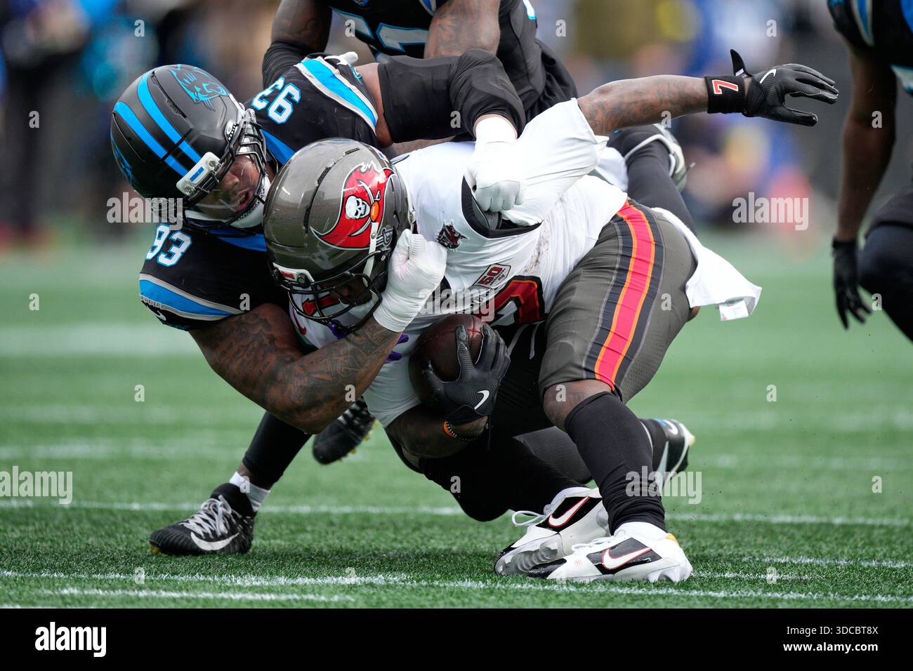 Tampa Bay Buccaneers running back Bucky Irving is tackled by Carolina ...
