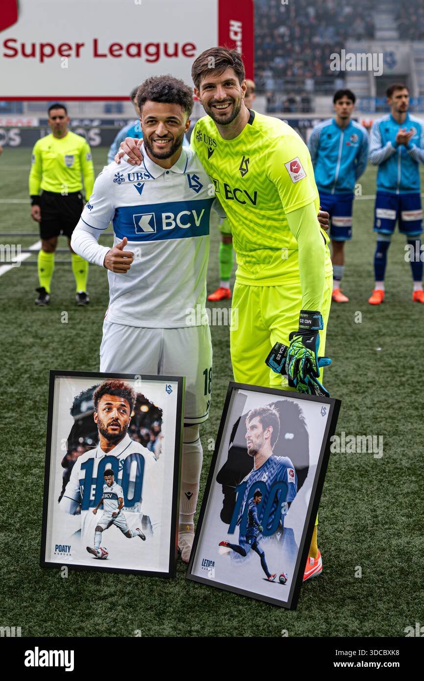 Karlo Letica (25 LS) and Morgan Poaty (18 LS) receiving a framed ...