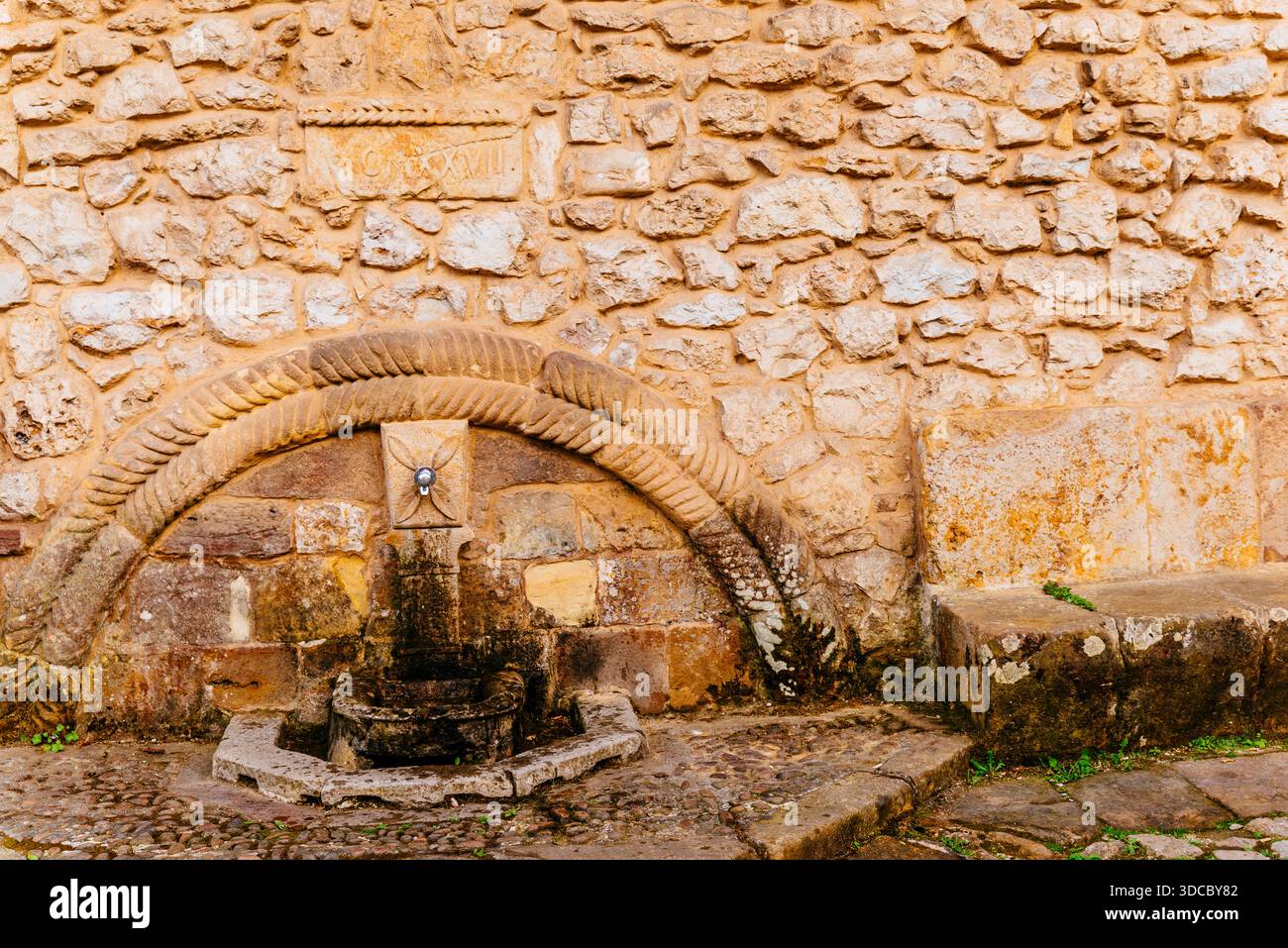 Fountain attached to the wall in the Plaza Mayor - Main Square. It is a ...