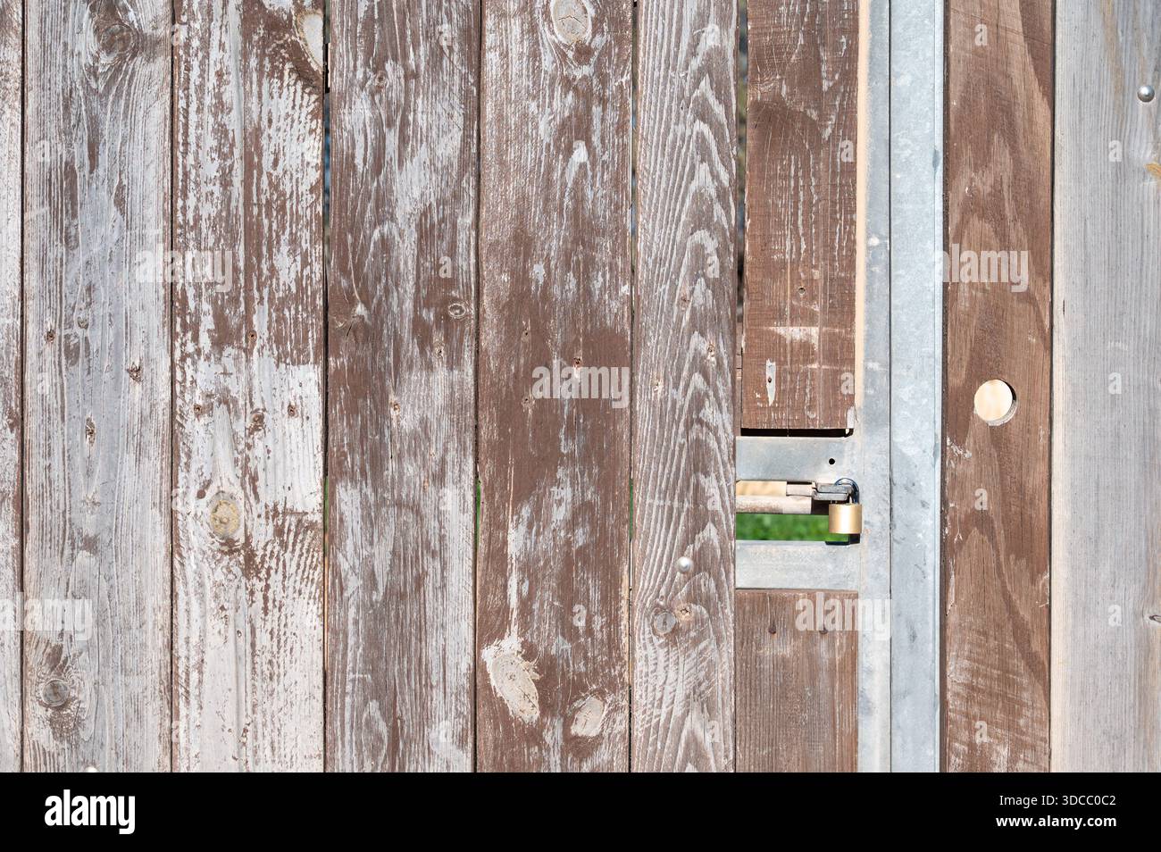 Weathered pale wooden panel fence with vertical planks, usable as ...