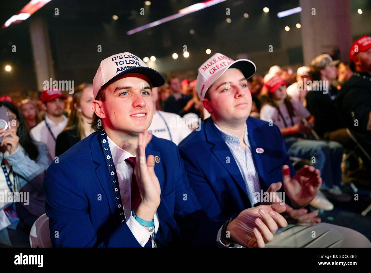 Supporters clap during Turning Point USA's AmericaFest 2025, Sunday ...