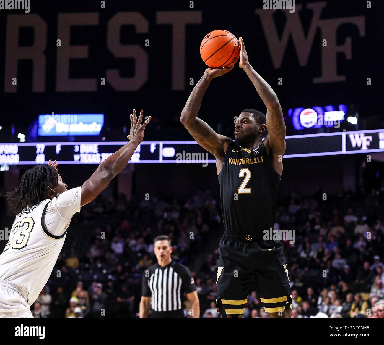 December 21, 2025: Vanderbilt guard Duke Miles (2) shots a 3point shot ...