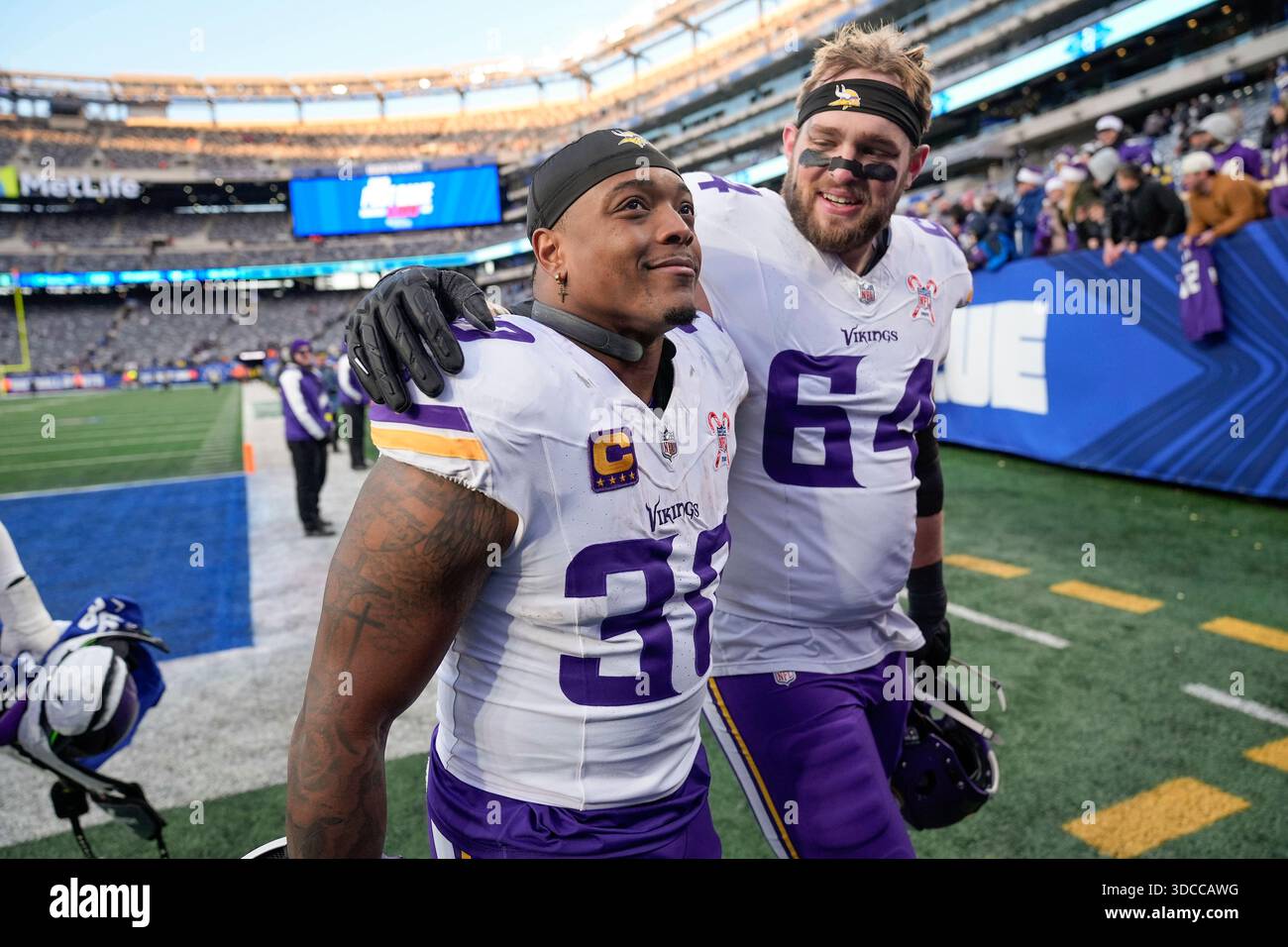 Minnesota Vikings fullback C.J. Ham (30) walks off the field with ...